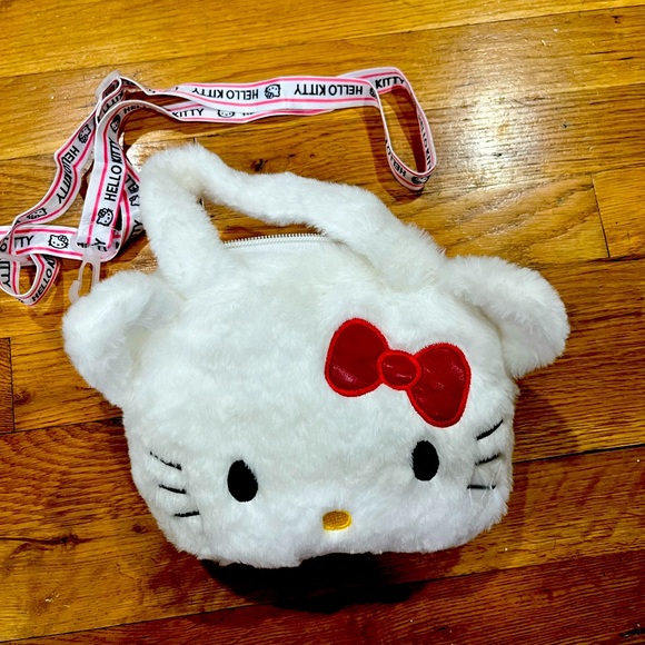Hello Kitty | Accessories | Hello Kitty Pocket Book | Poshmark